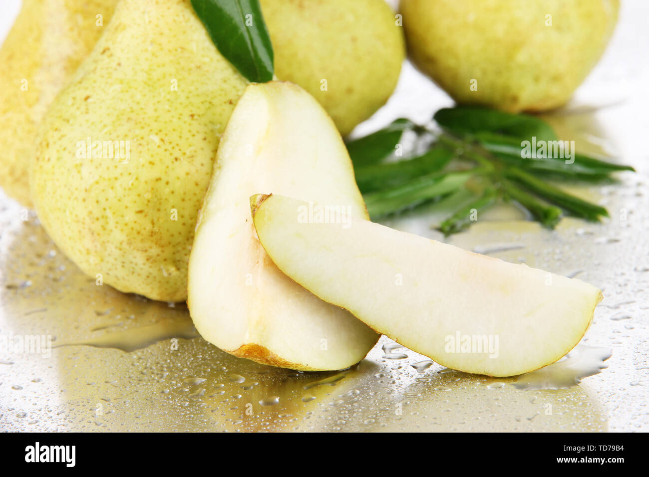 Pears on metal background Stock Photo - Alamy