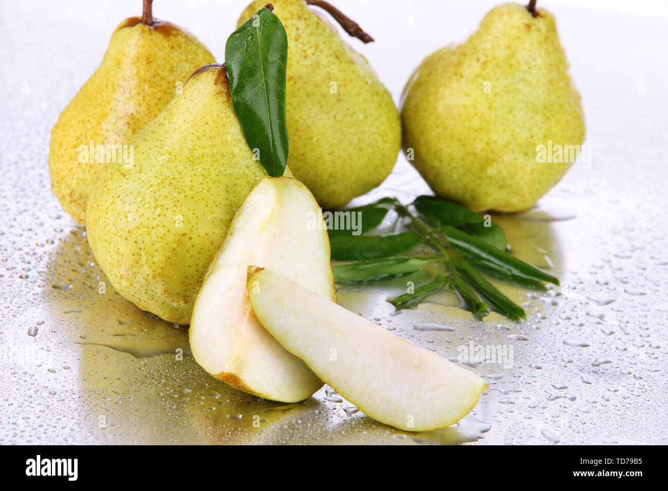 Pears on metal background Stock Photo - Alamy