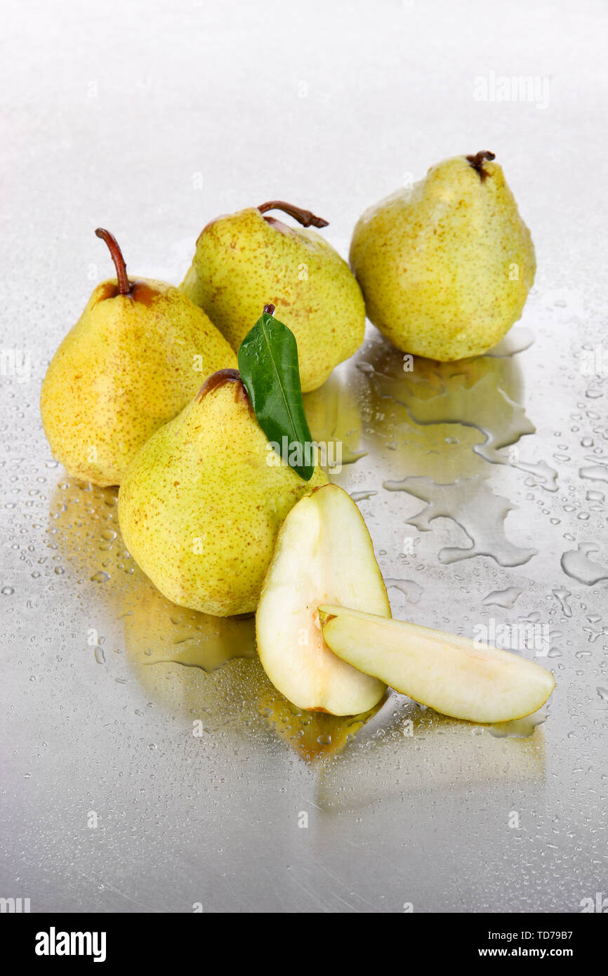 Pears on metal background Stock Photo - Alamy