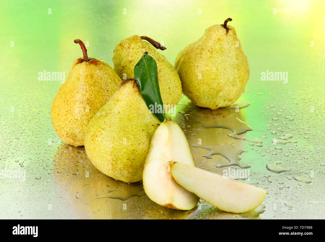 Pears on nature background Stock Photo - Alamy