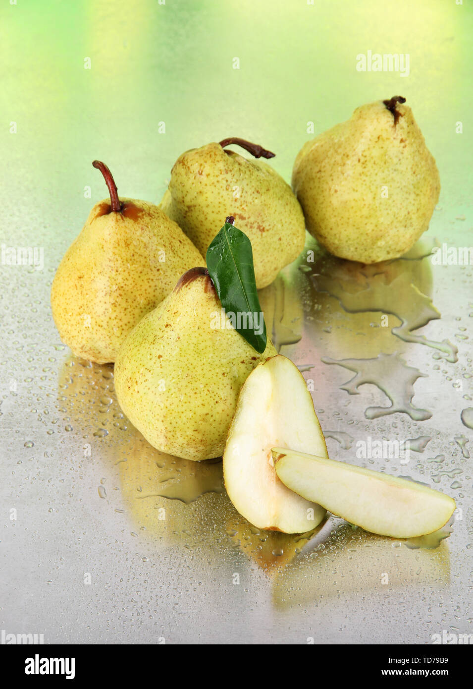 Pears on nature background Stock Photo - Alamy