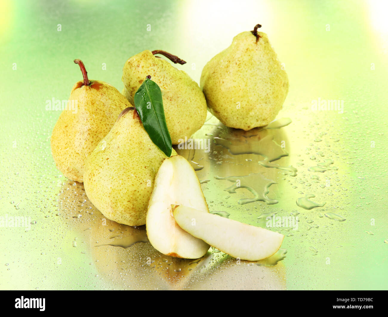 Pears on nature background Stock Photo - Alamy