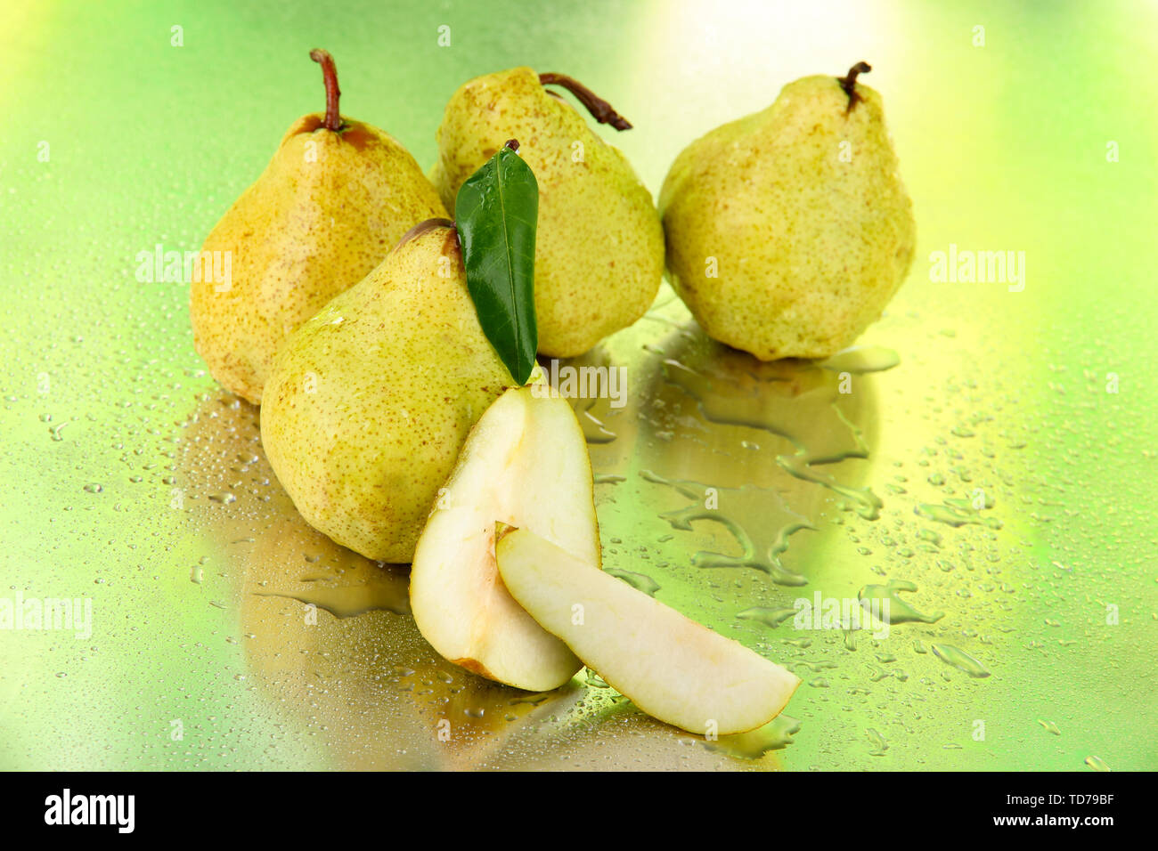Pears on nature background Stock Photo - Alamy
