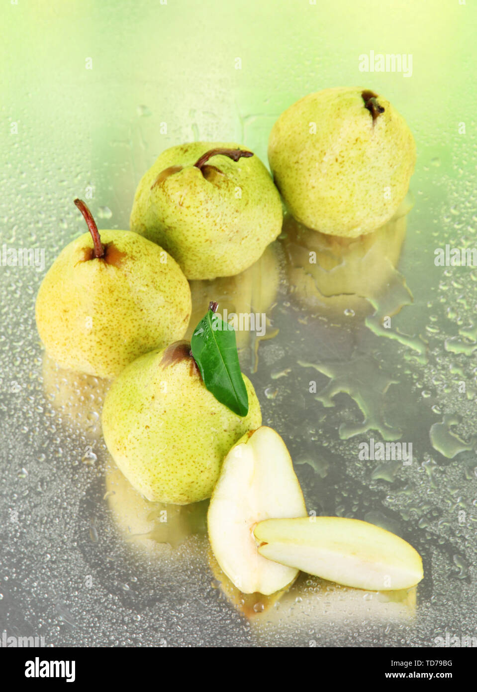 Pears on nature background Stock Photo - Alamy