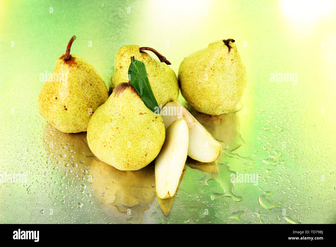 Pears on nature background Stock Photo - Alamy
