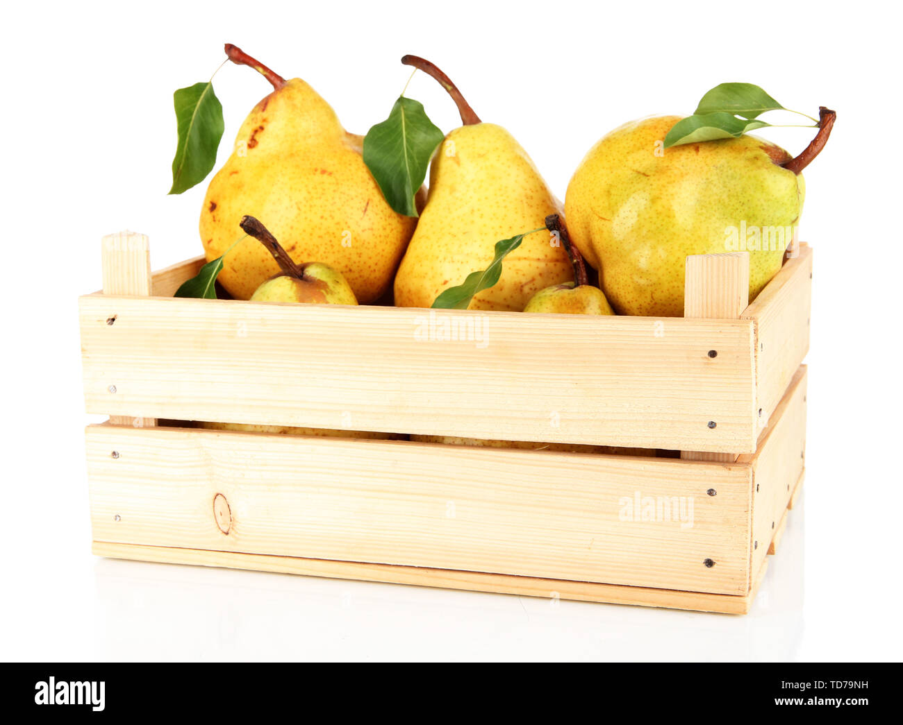 Juicy pears in wooden box isolated on white Stock Photo - Alamy