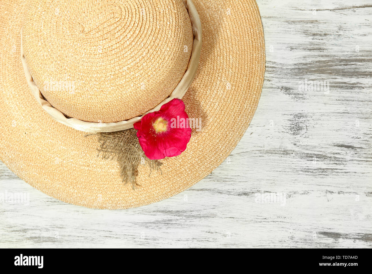 Beautiful summer hat on wooden background Stock Photo - Alamy