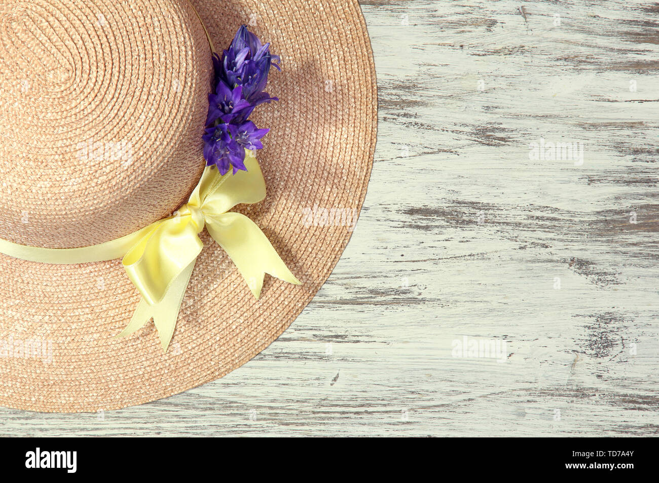 Beautiful summer hat on wooden background Stock Photo - Alamy