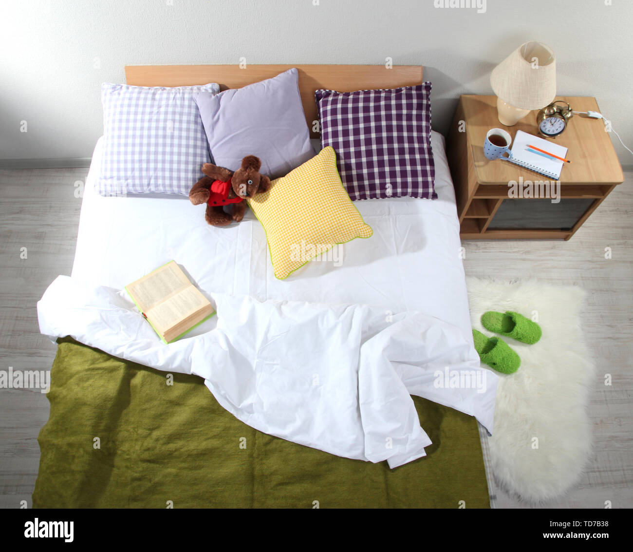 Bed in room top view close-up Stock Photo - Alamy
