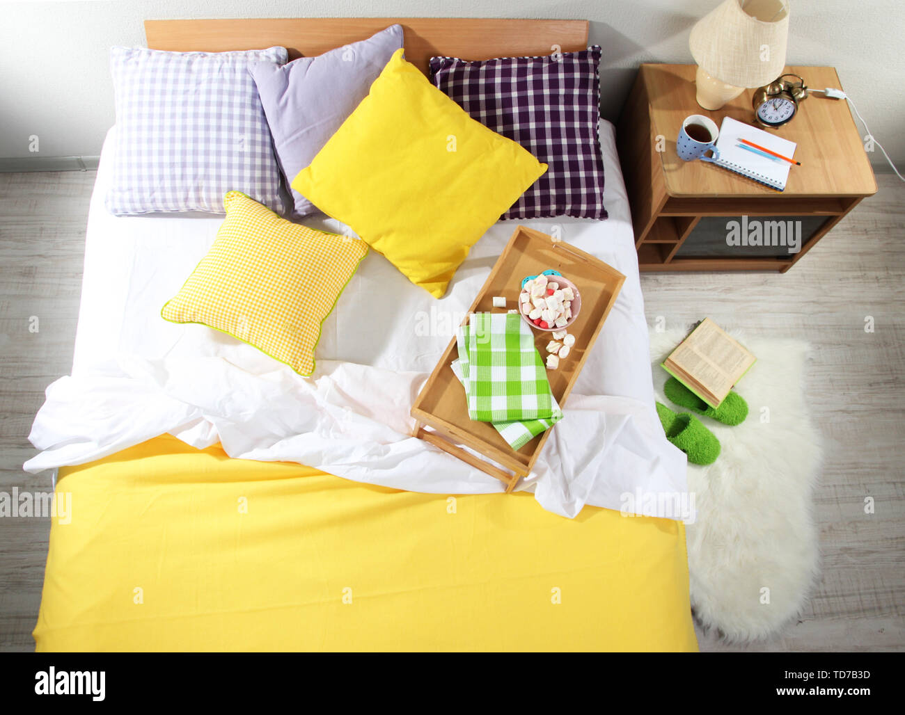 Bed with breakfast in room top view close-up Stock Photo - Alamy