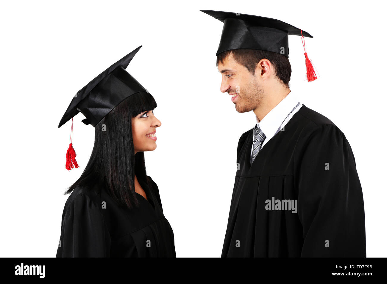 Two happy graduating students isolated on white Stock Photo - Alamy