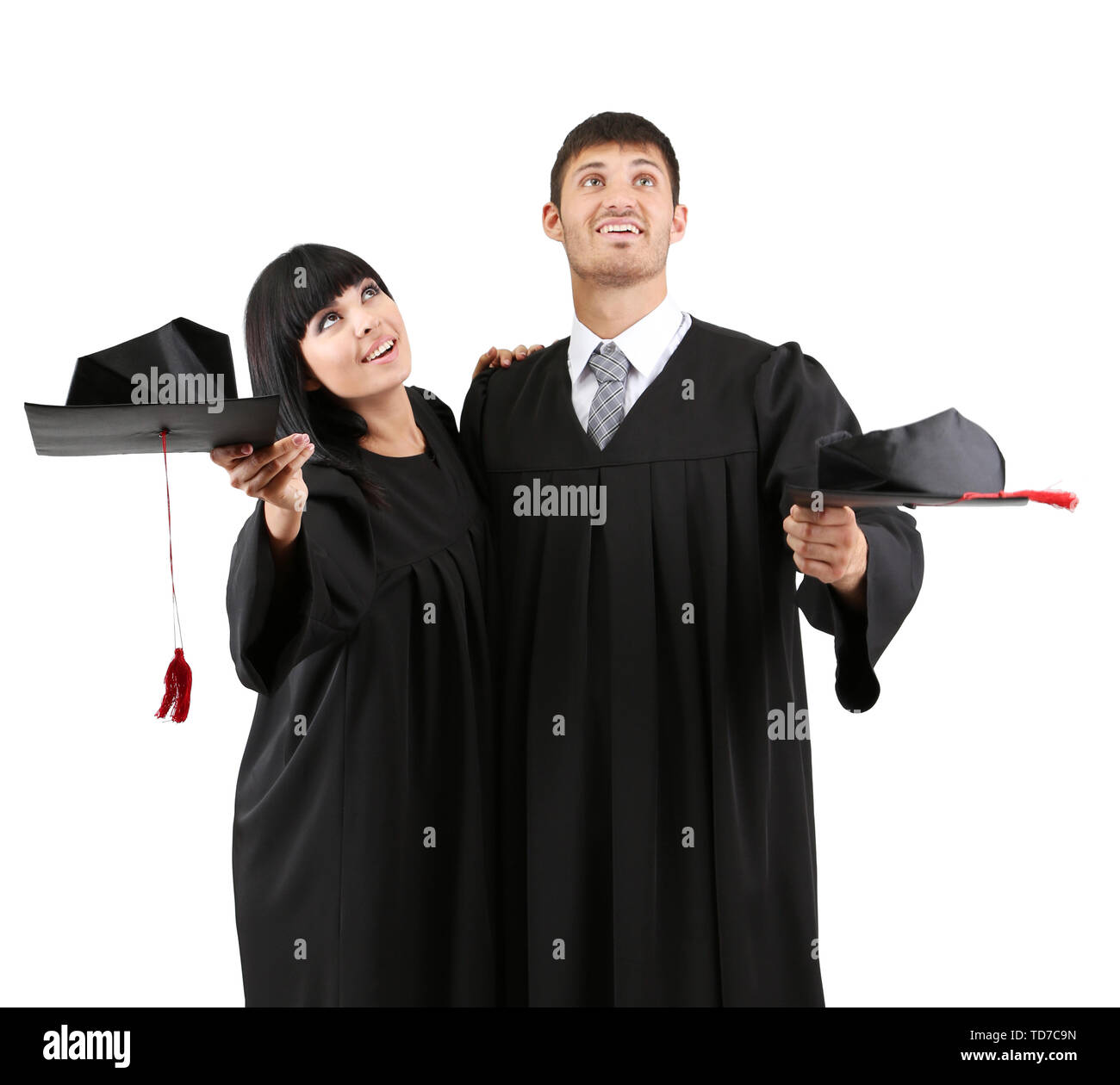 Two happy graduating students isolated on white Stock Photo - Alamy