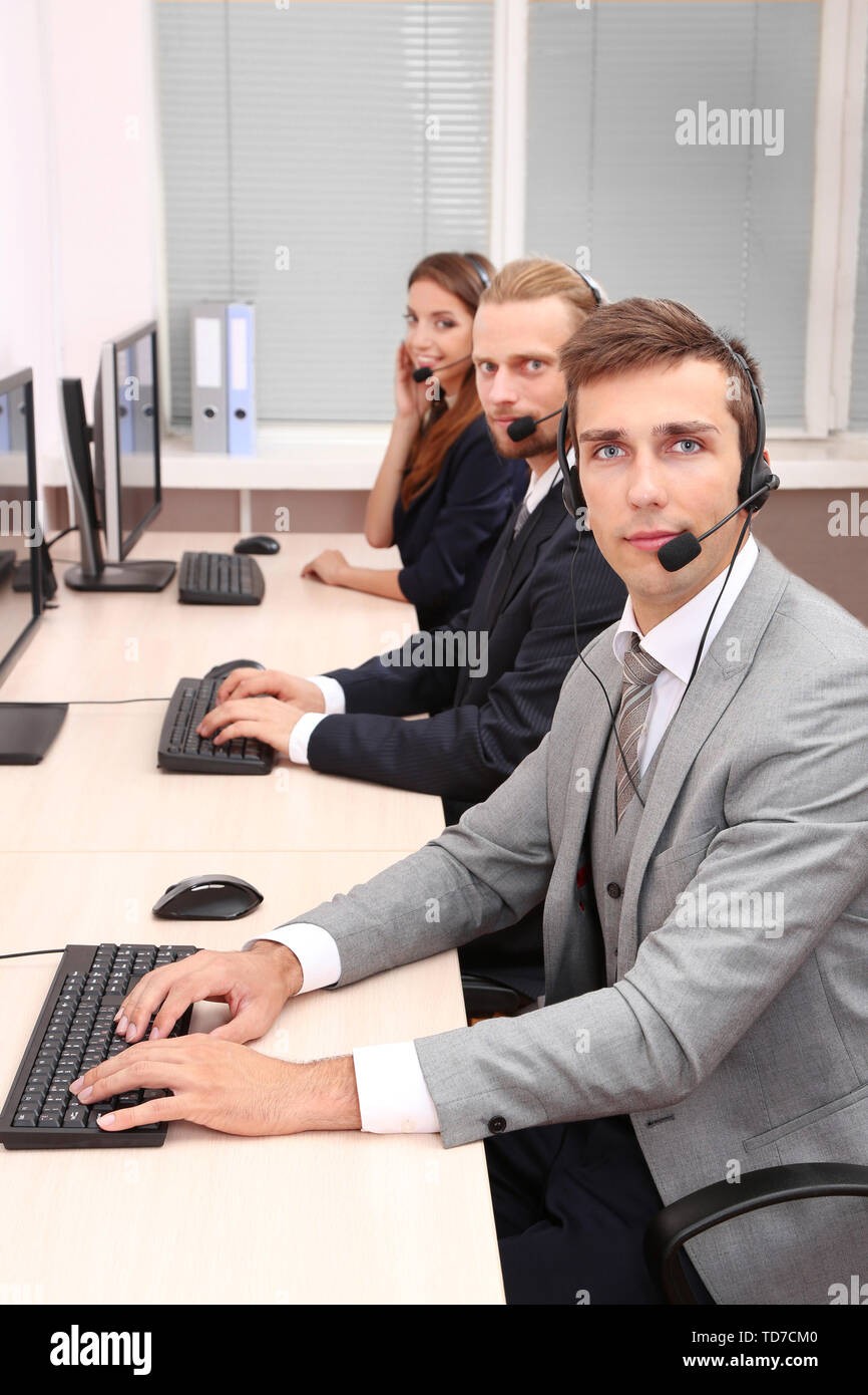 Call center operators at work Stock Photo - Alamy