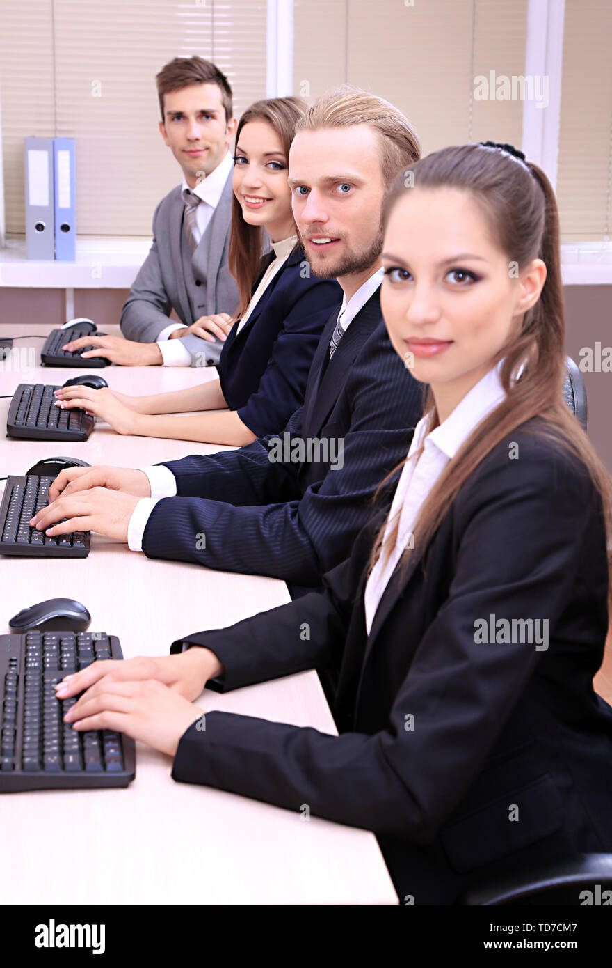 Business people at work place Stock Photo - Alamy