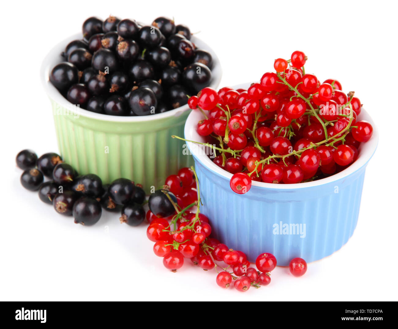 Red and black currant in bowls isolated on white Stock Photo - Alamy