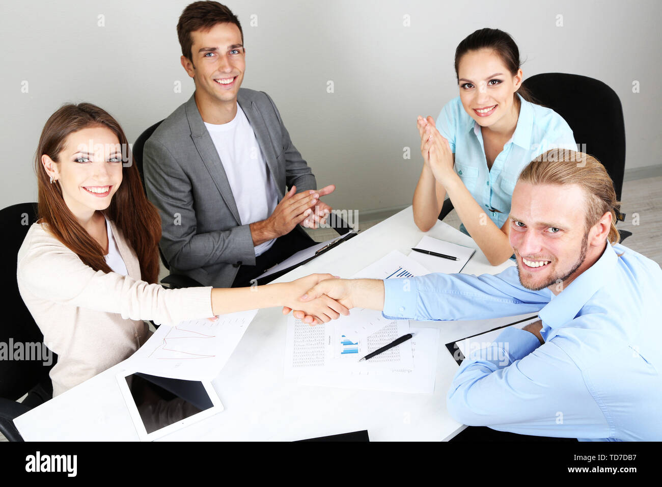 Business team working on their project together at office Stock Photo ...