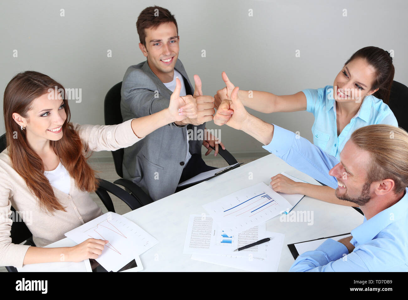Business team working on their project together at office Stock Photo ...