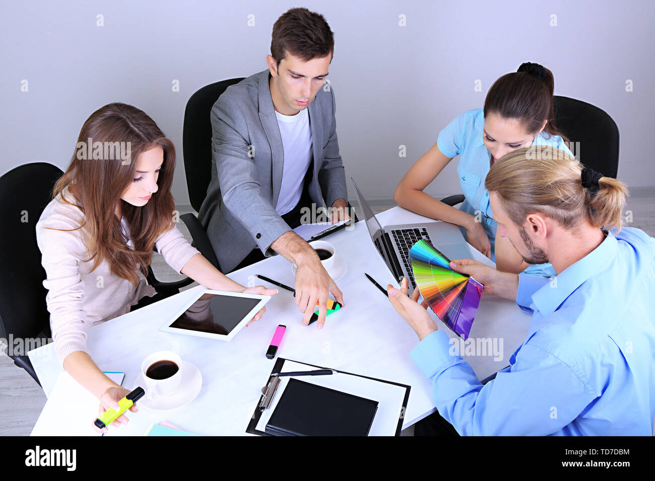Business team working on their project together at office Stock Photo ...