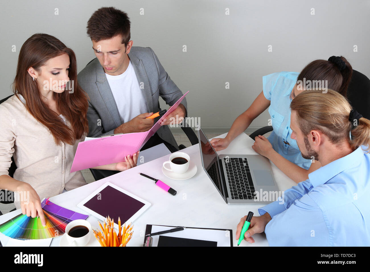 Business team working on their project together at office Stock Photo ...