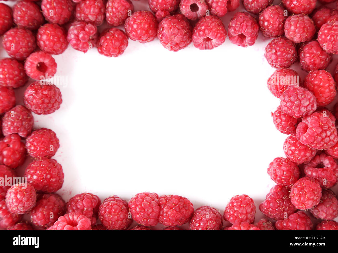 Ripe sweet raspberries isolated on white Stock Photo - Alamy