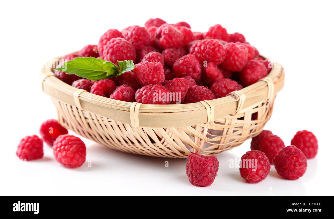Ripe sweet raspberries in basket, isolated on white Stock Photo - Alamy