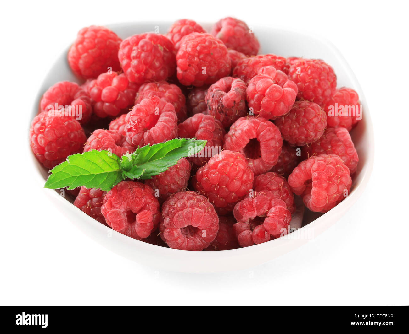 Ripe sweet raspberries in bowl, isolated on white Stock Photo - Alamy