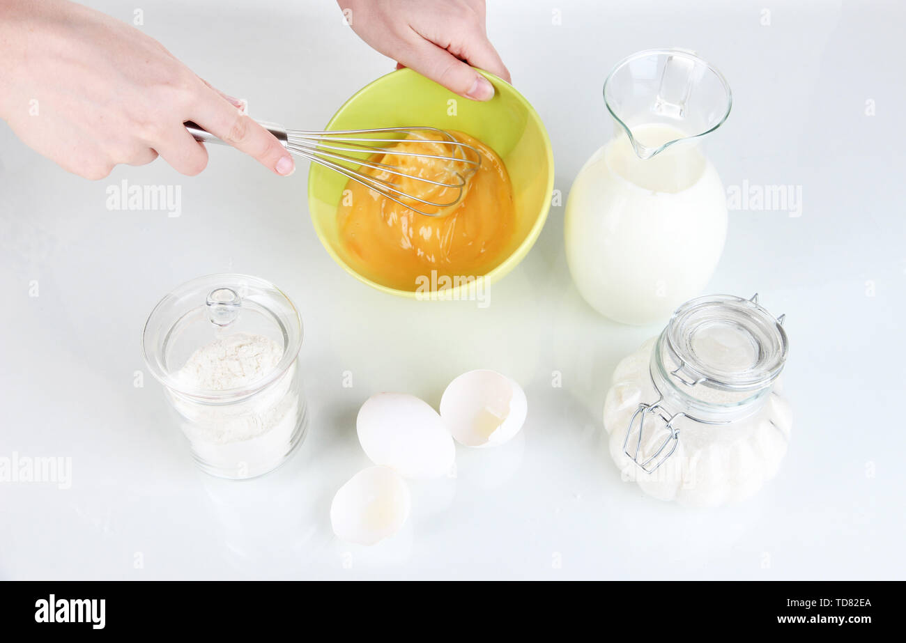 White home baker whisking eggs hi-res stock photography and images - Alamy
