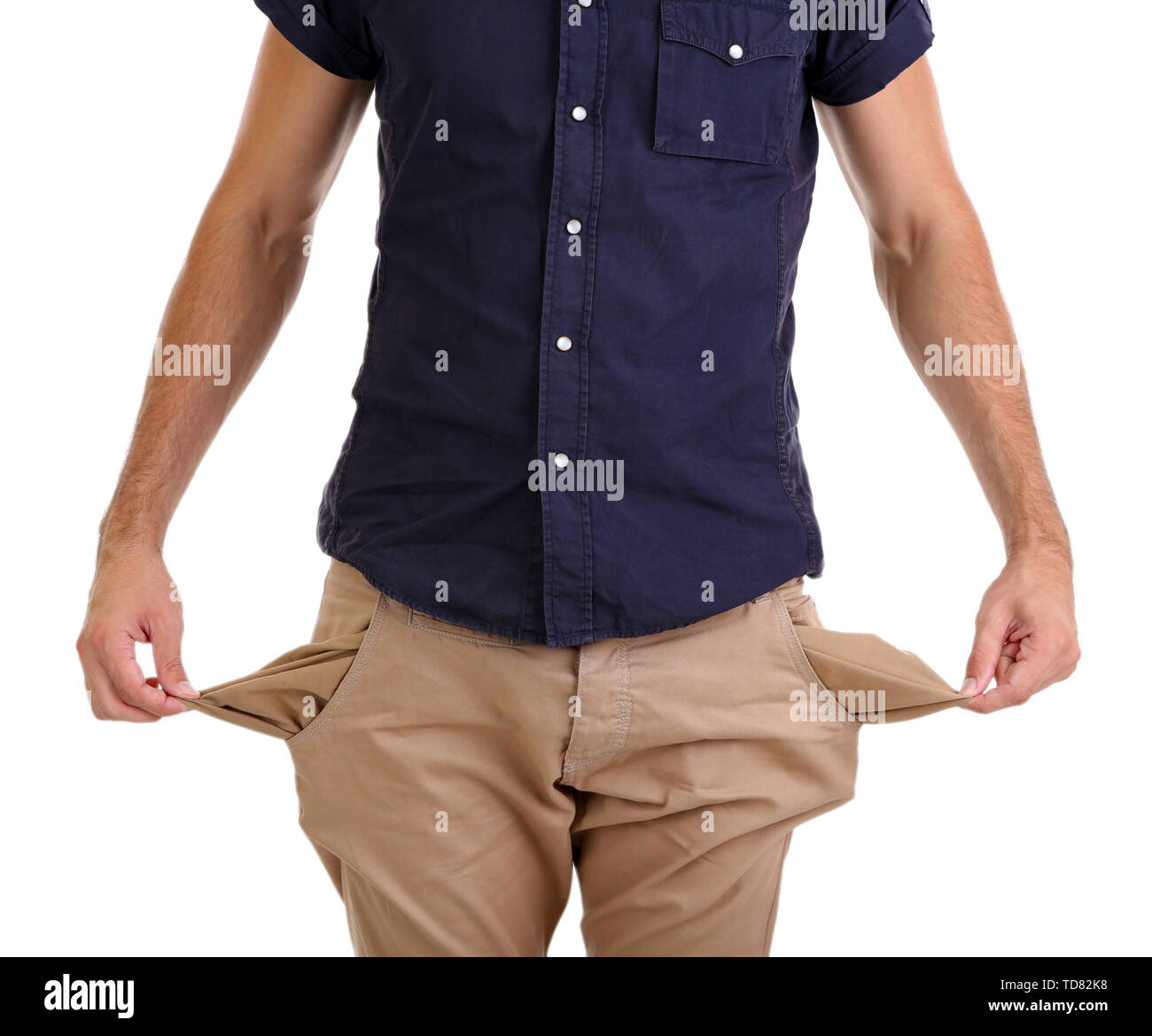 Man showing his empty pockets, isolated on white Stock Photo - Alamy