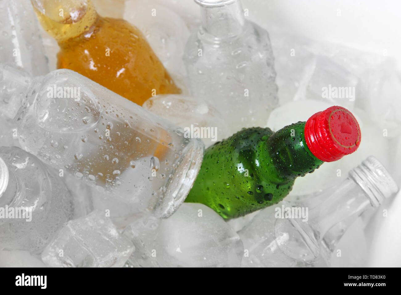 Minibar bottles with ice cubes, close-up Stock Photo - Alamy
