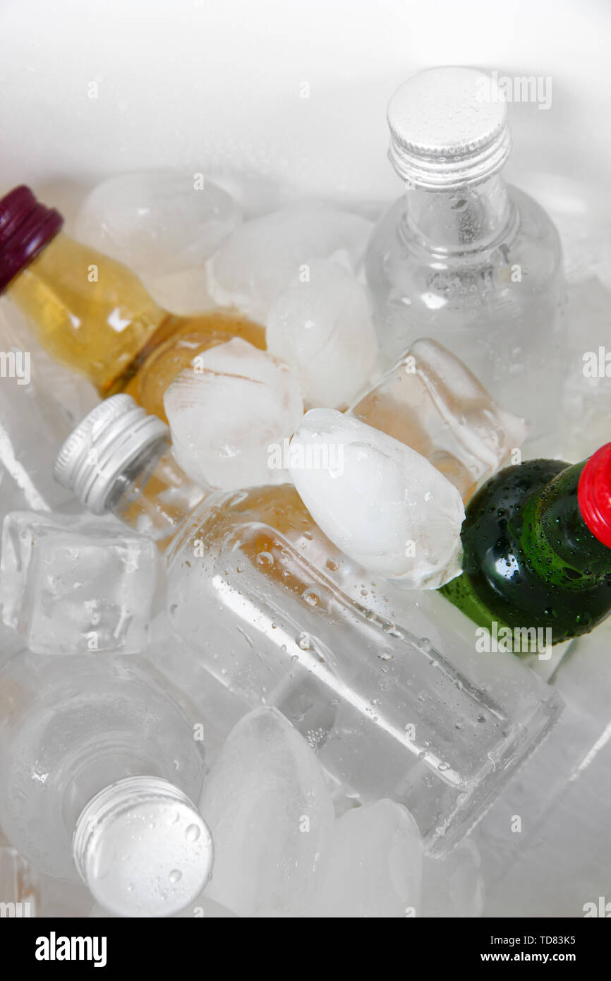 Minibar bottles with ice cubes, close-up Stock Photo - Alamy