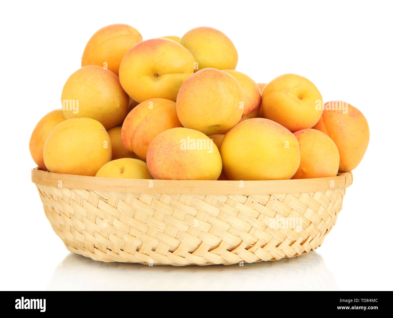 Fresh natural apricot in wicker basket isolated on white Stock Photo ...