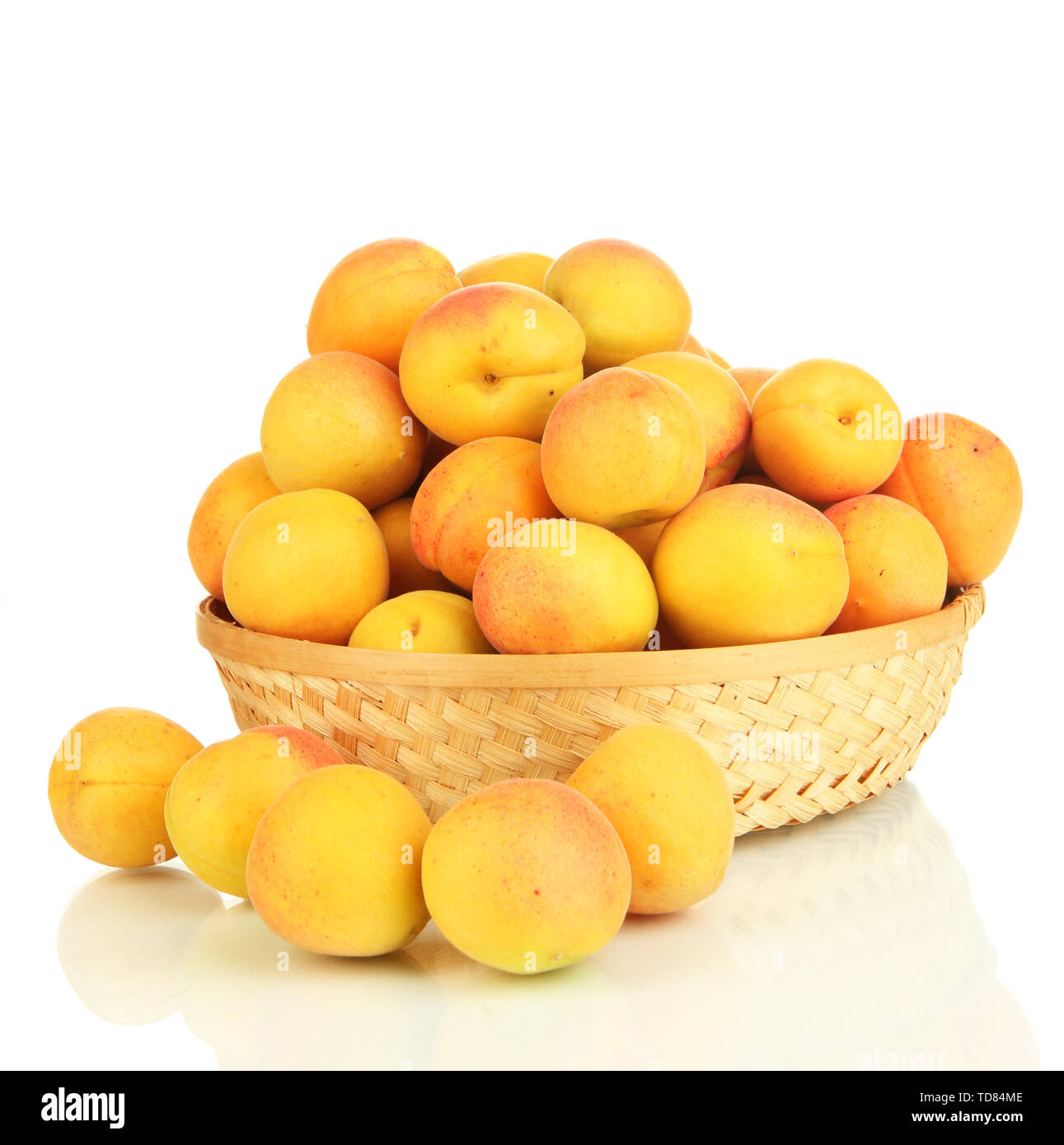 Fresh natural apricot in wicker basket isolated on white Stock Photo ...