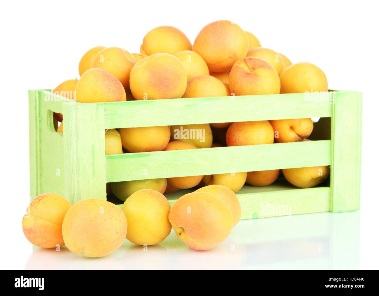 Fresh natural apricot in wooden box isolated on white Stock Photo - Alamy