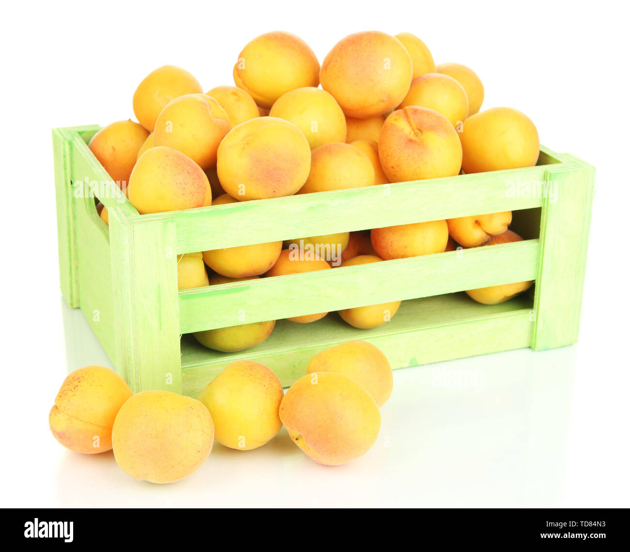 Fresh natural apricot in wooden box isolated on white Stock Photo - Alamy