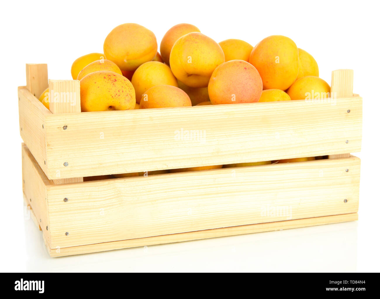 Fresh natural apricot in wooden box isolated on white Stock Photo - Alamy