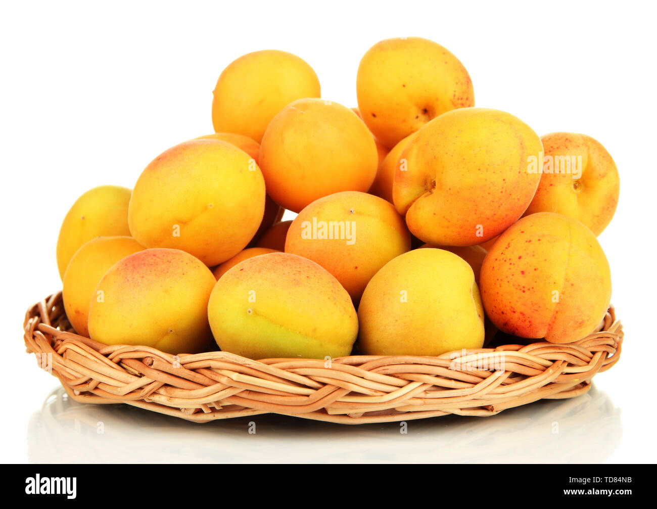 Fresh natural apricot in wicker basket isolated on white Stock Photo ...