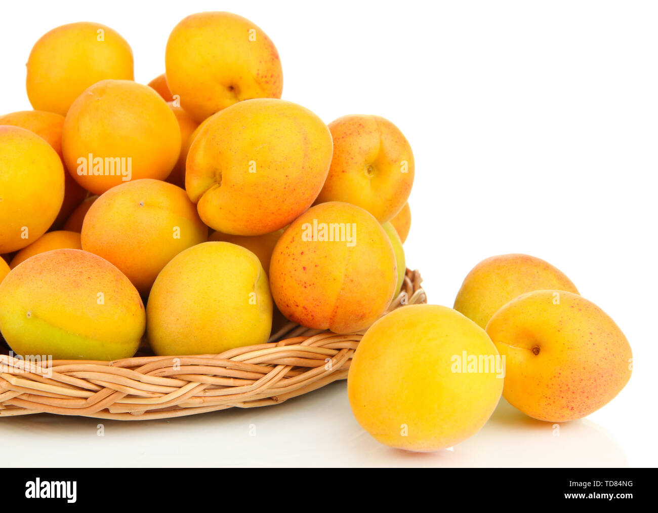 Fresh natural apricot in wicker basket isolated on white Stock Photo ...