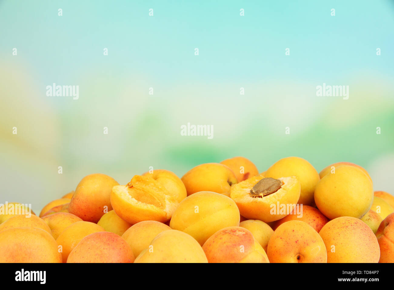 Fresh natural apricot on bright background Stock Photo - Alamy