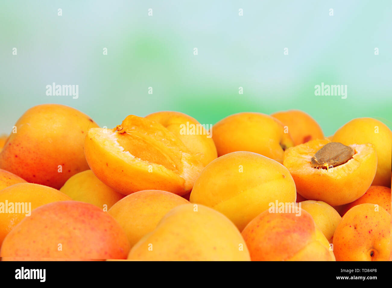 Fresh natural apricot on bright background Stock Photo - Alamy