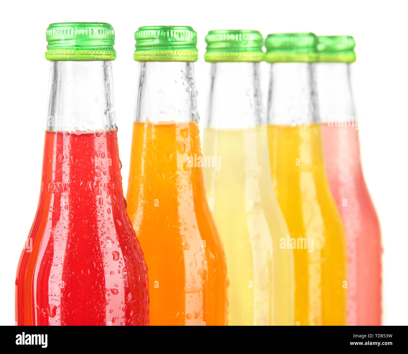 Bottles with tasty drinks, isolated on white Stock Photo - Alamy