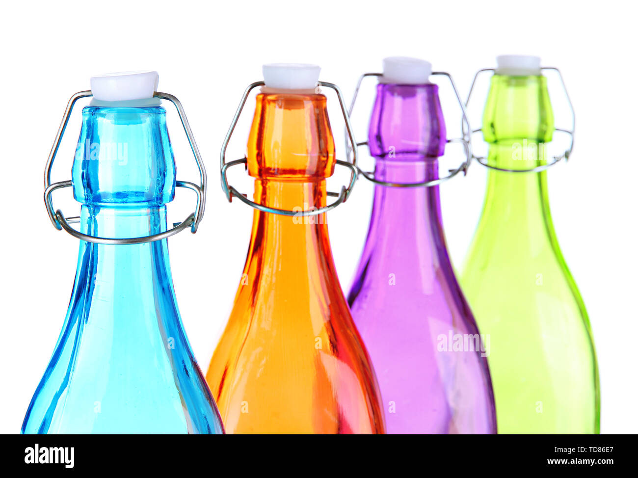 Colorful bottles isolated on white Stock Photo - Alamy