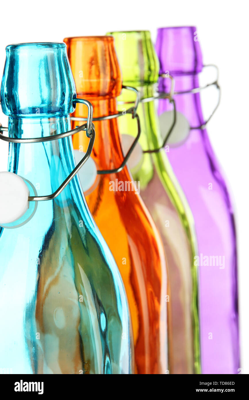 Colorful bottles isolated on white Stock Photo - Alamy