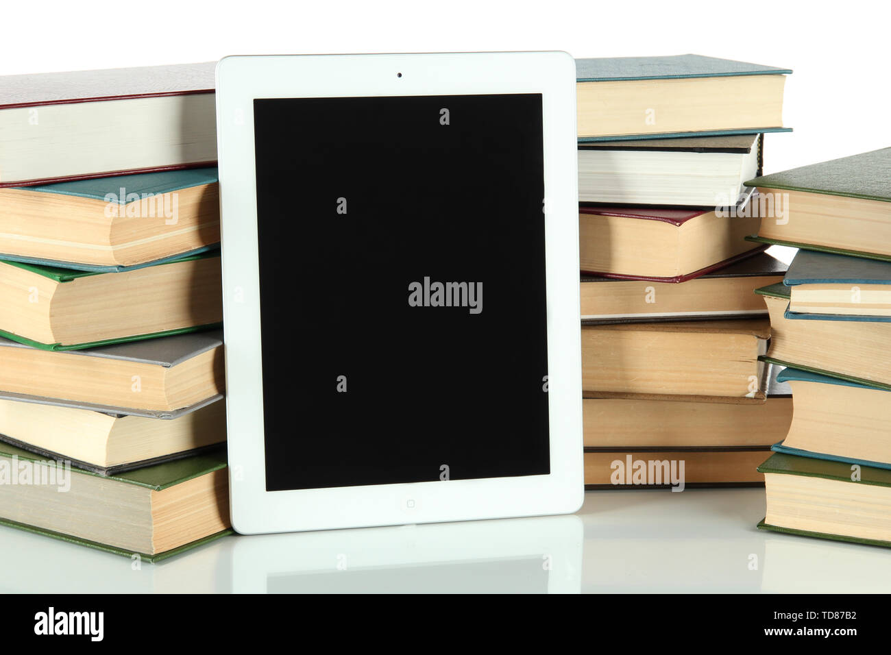 Tablet and books isolated on white Stock Photo - Alamy