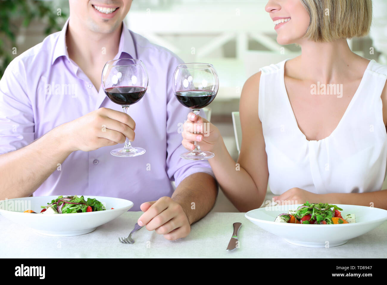 Beautiful couple having romantic dinner at restaurant Stock Photo - Alamy