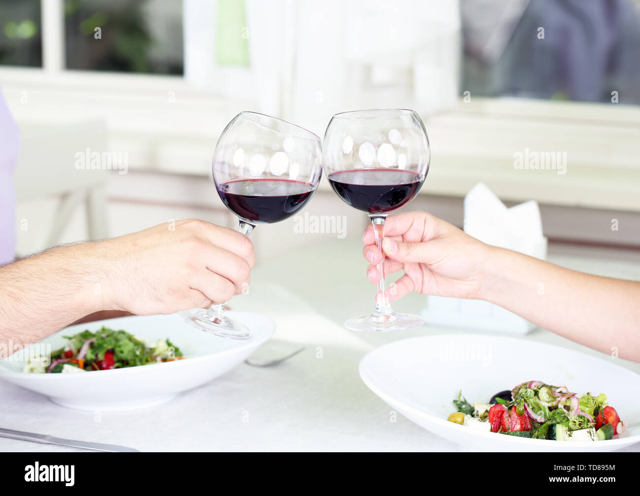 Beautiful couple having romantic dinner at restaurant Stock Photo - Alamy