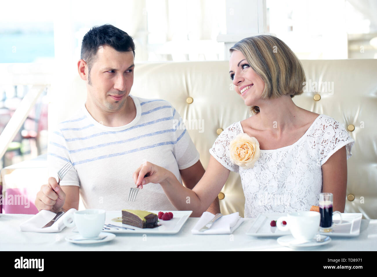 Beautiful couple having romantic dinner at restaurant Stock Photo - Alamy