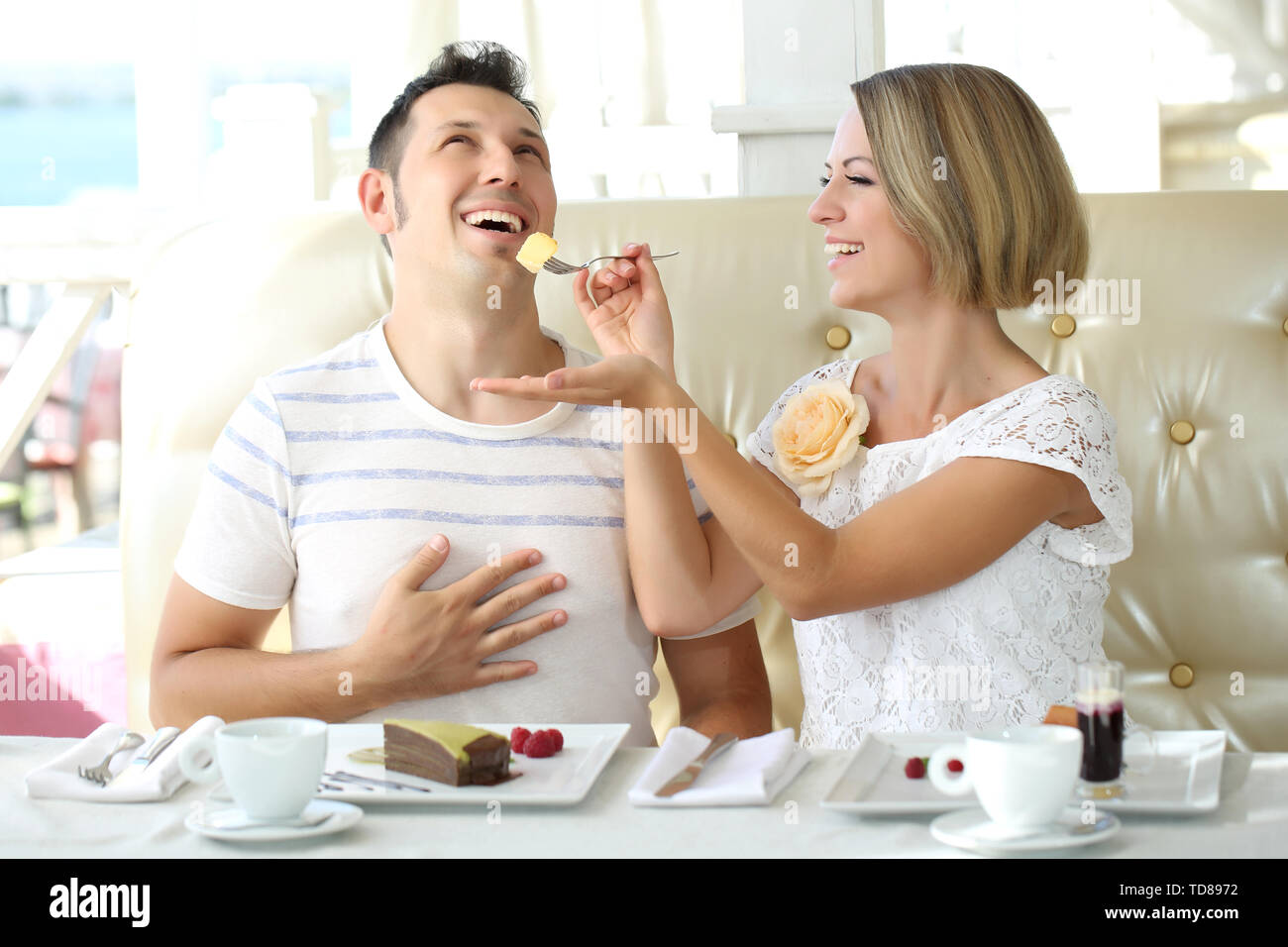 Beautiful couple having romantic dinner at restaurant Stock Photo - Alamy