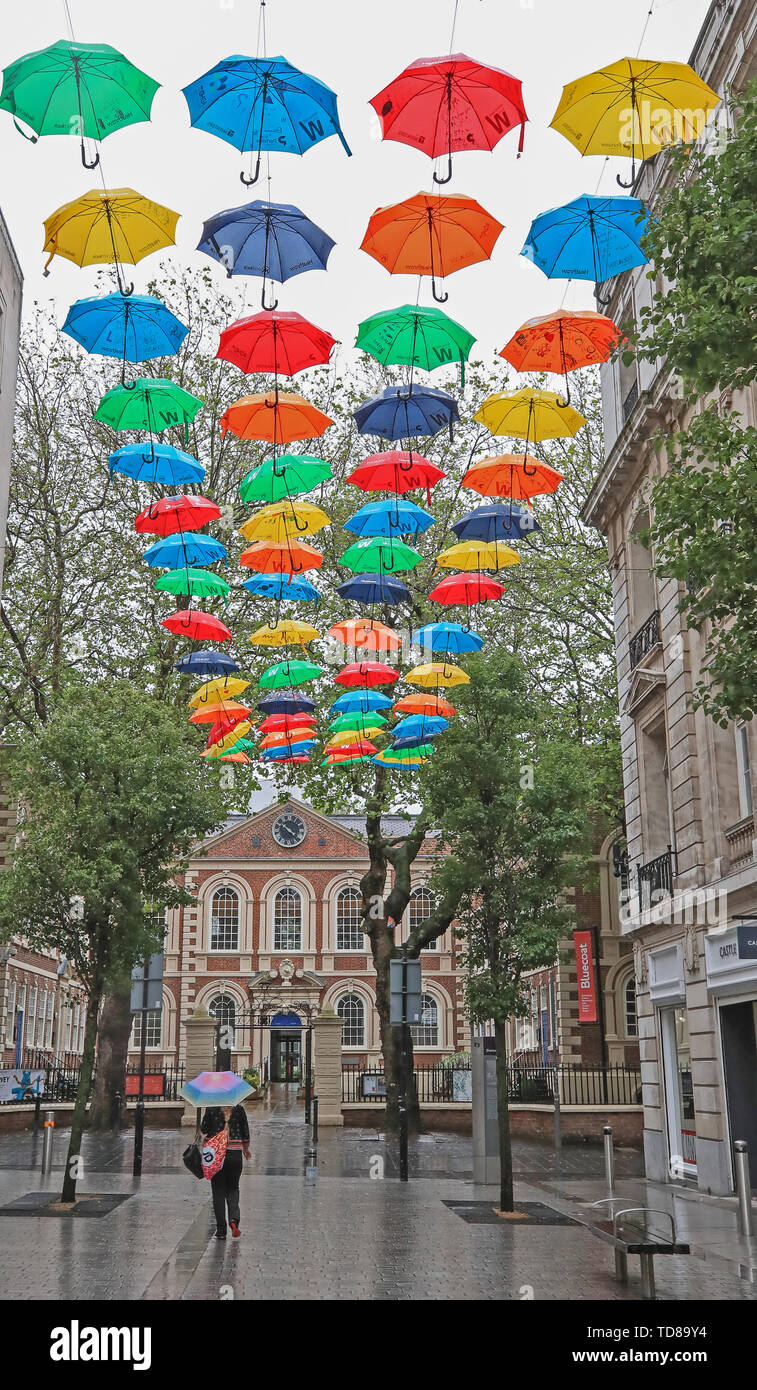 Members of the public walk beneath the ADHD Foundation's Umbrella ...