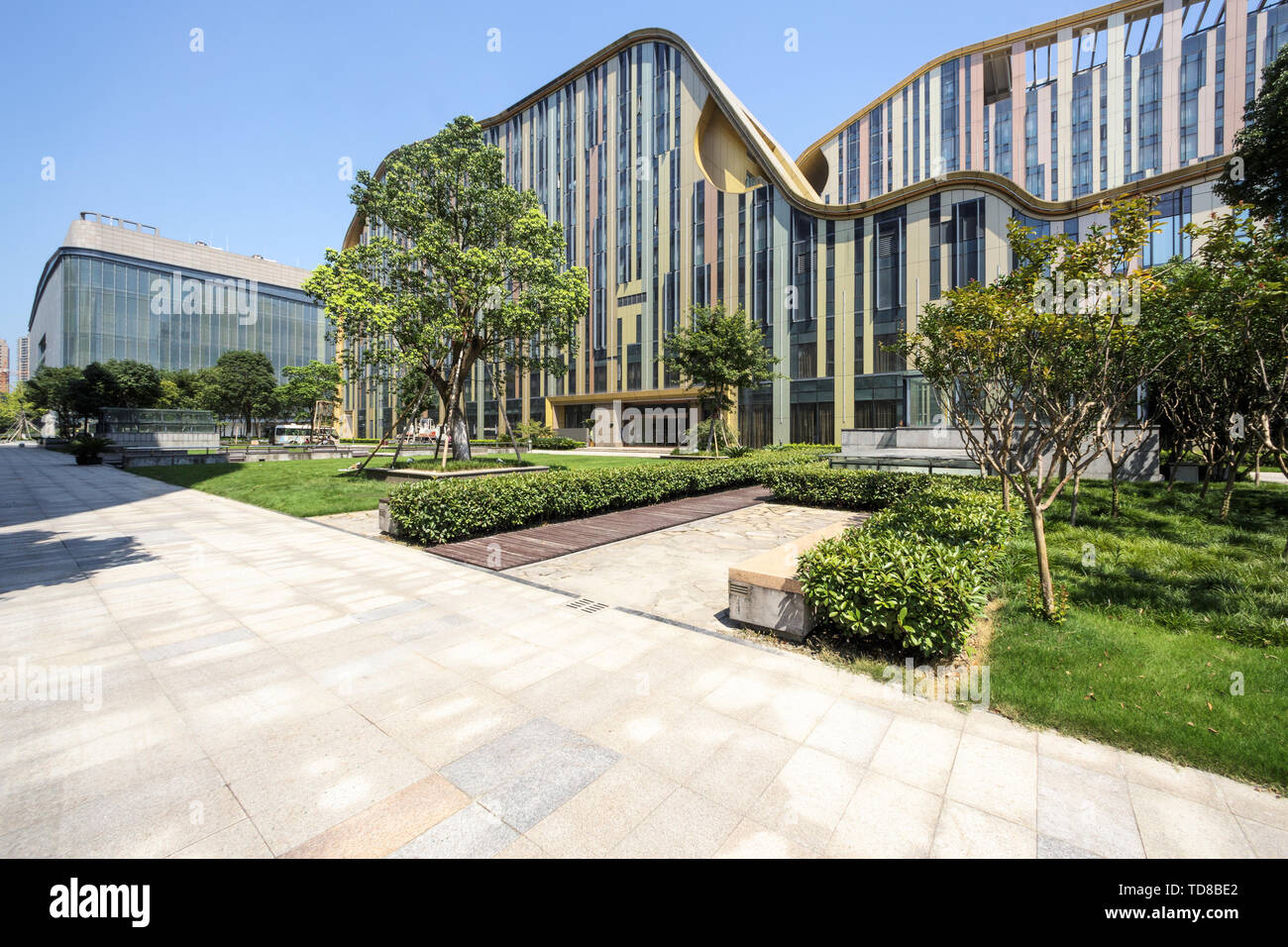 modern square and skyscrapers under sunbeam Stock Photo - Alamy