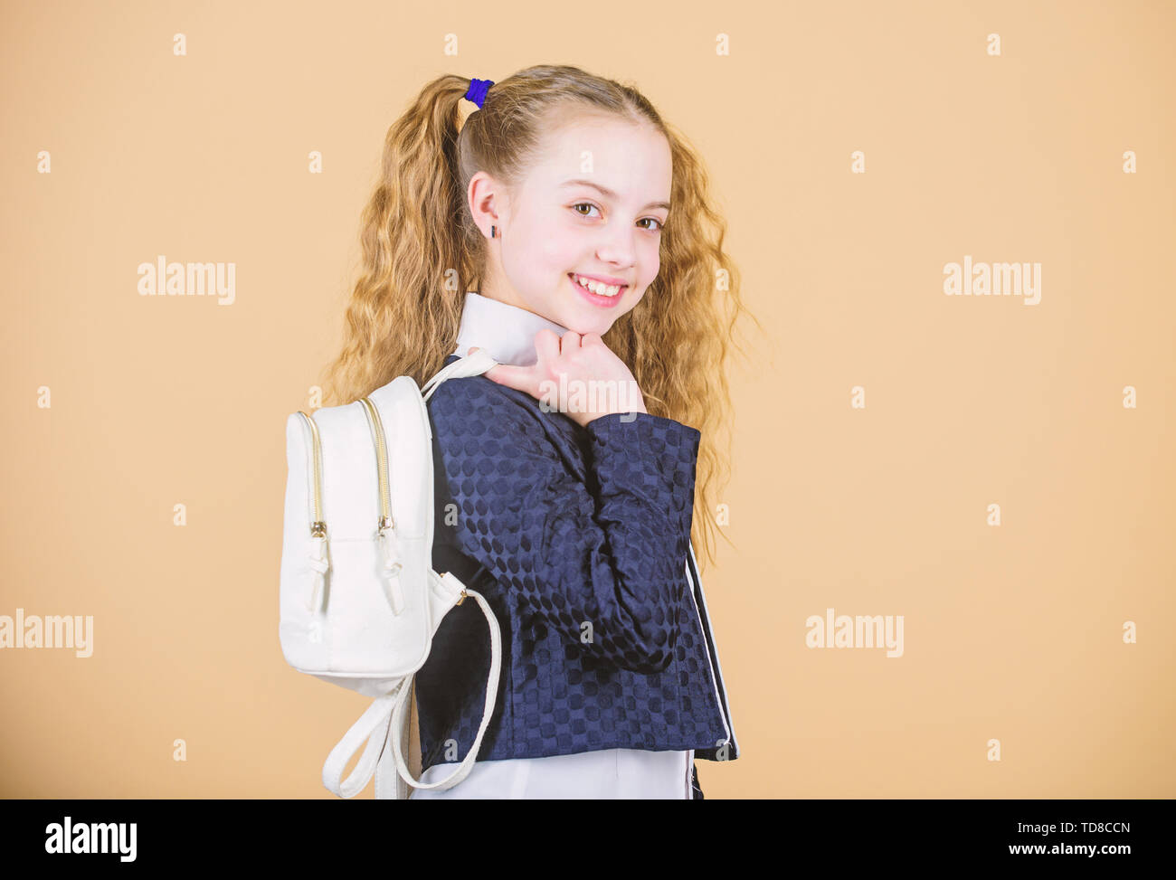 Stylish mini backpack. Learn how fit backpack correctly. Girl little ...